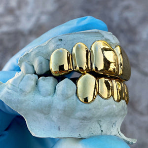 Permanent cuts gold plated custom grillz. Gold plated over real solid ...